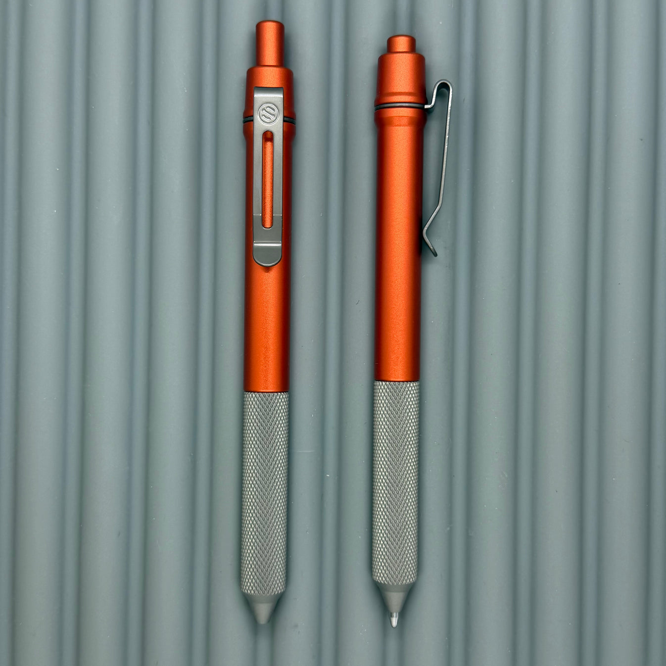 > Spoke Click Model C: Orange Lava Aluminum / Matte Titanium Peak Knur ...
